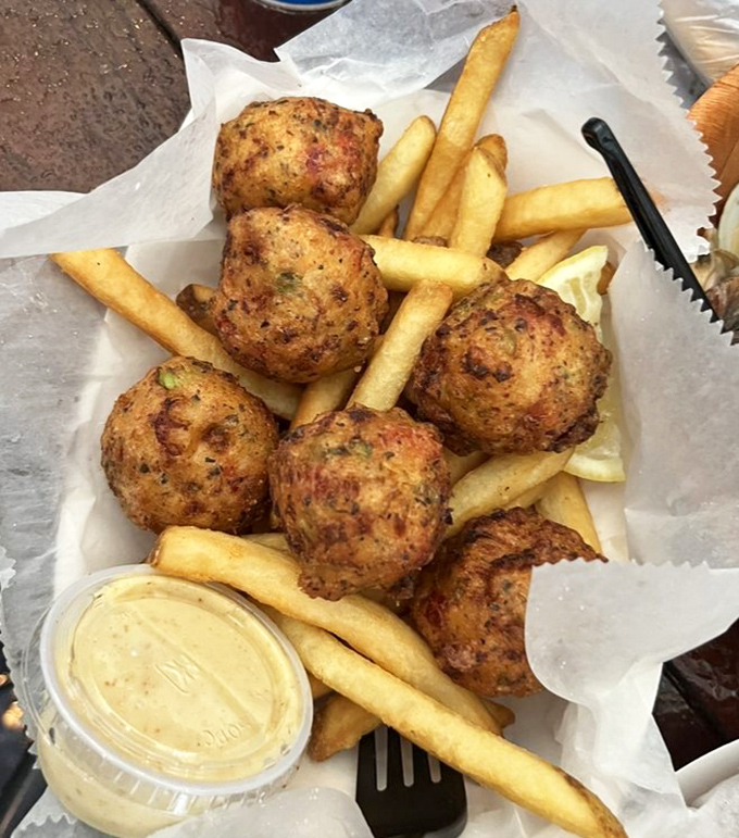 These conch fritters aren't just fried balls of goodness; they're edible postcards from the Keys, served with a side of nostalgia.