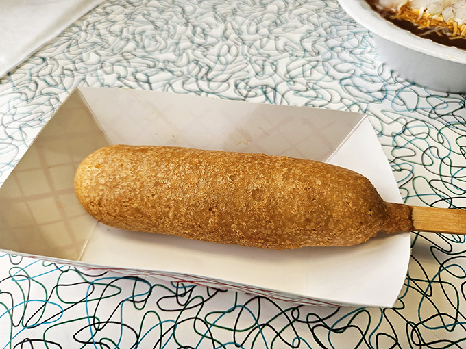 The star of the show: a perfectly golden Cozy Dog. Like Michelangelo's David, but cornmeal-battered and actually satisfying when you're hungry.