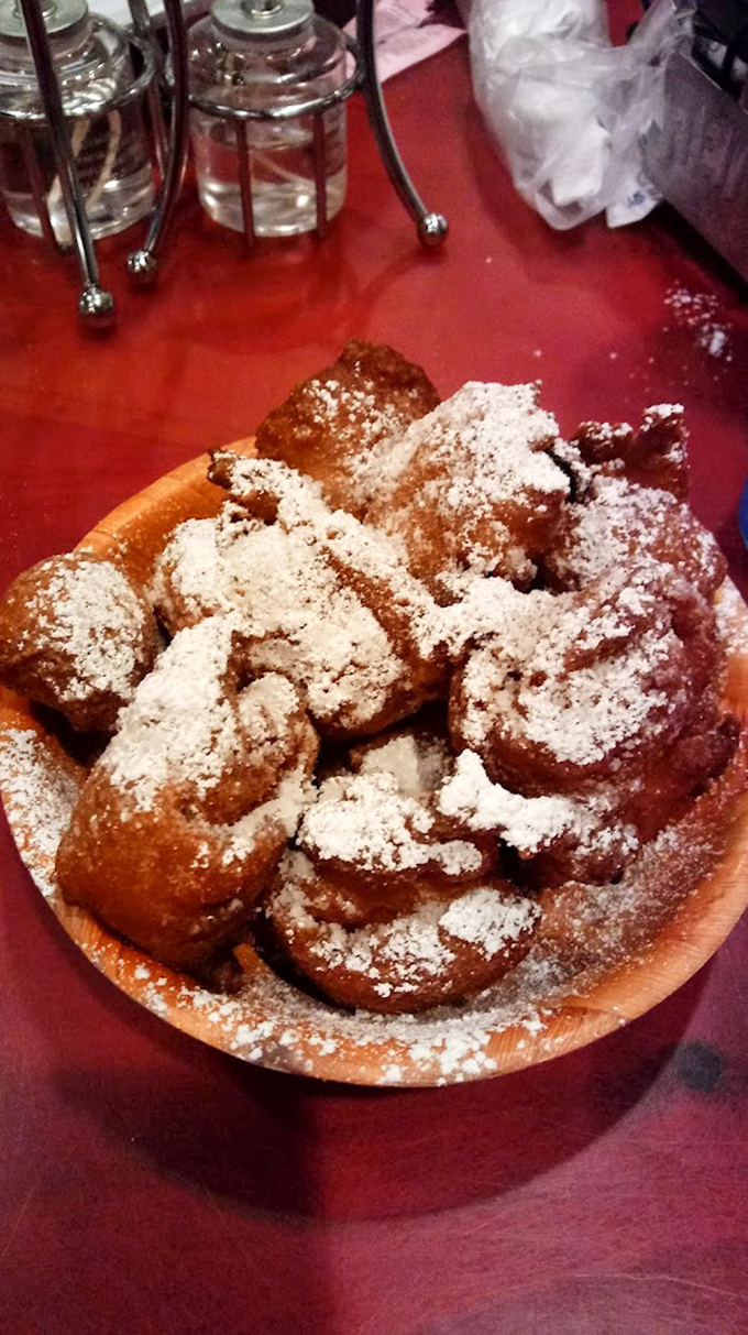 These powdered sugar-dusted corn fritters aren't just dessert&mdash;they're little clouds of happiness that make you wonder why vegetables ever bothered being healthy.