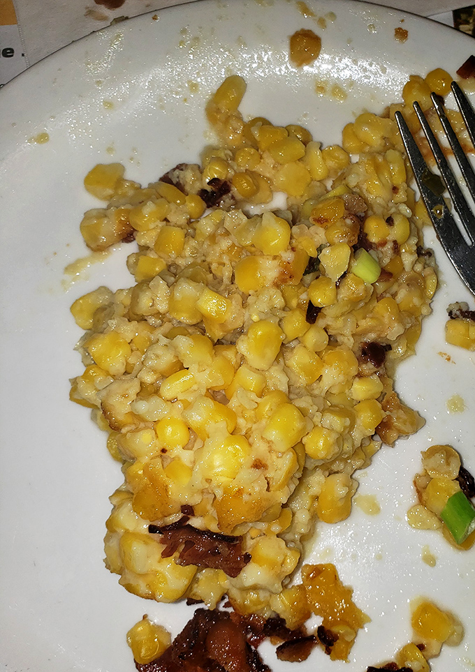 Corn casserole that straddles the line between side dish and dessert. Each kernel seems to have signed a pact with butter and cream to deliver maximum comfort.