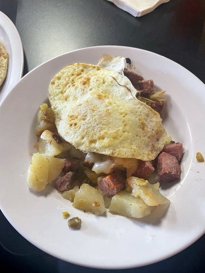 A hearty corned beef hash topped with a sunny-side egg&mdash;the breakfast of champions and the cure for whatever ailed you yesterday.