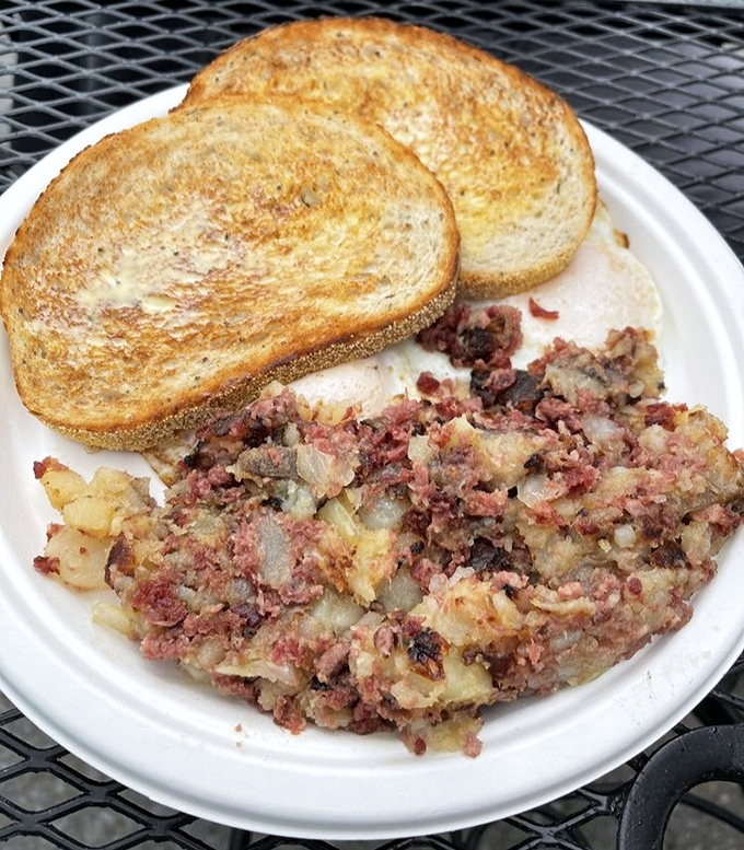 Corned beef hash that doesn't come from a can, paired with toast that actually tastes like bread. Simple pleasures that remind you why diners matter.