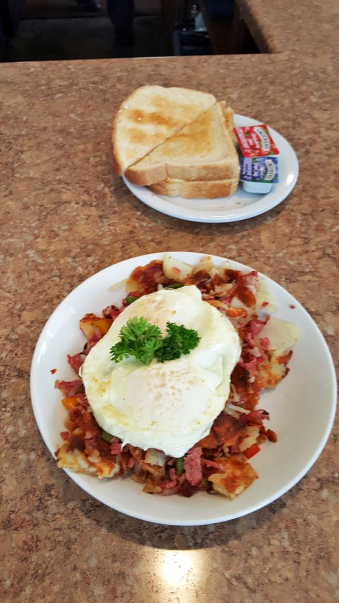 Corned beef hash topped with a perfectly fried egg &ndash; the breakfast equivalent of finding an extra $20 in your winter coat pocket.