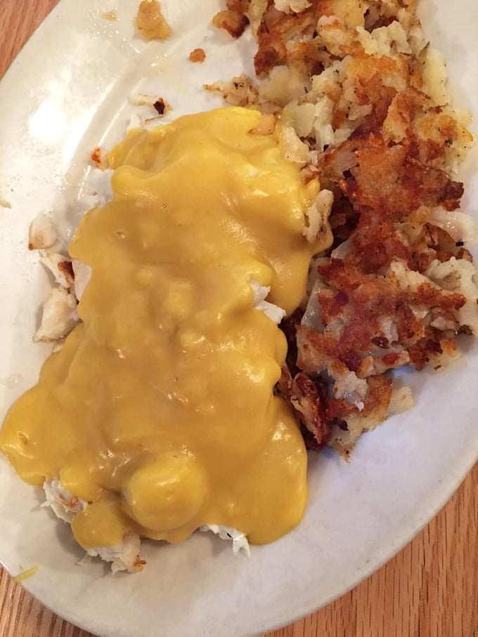 Hollandaise sauce cascading over perfectly cooked potatoes &ndash; proof that some morning masterpieces don't require fancy art school credentials.