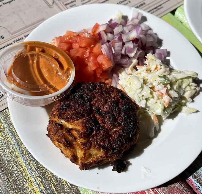 The perfect crab cake doesn't exi&mdash; wait, there it is! Golden-crisp exterior giving way to sweet, jumbo lump meat that needs no introduction.