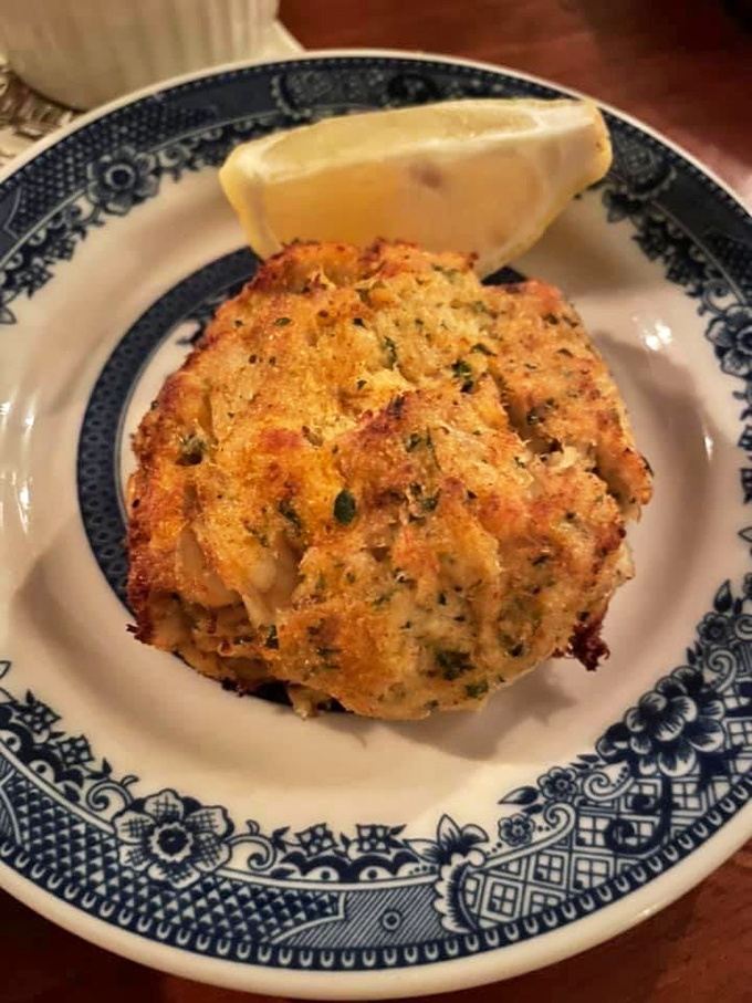 Not just a crab cake but a golden-crusted Maryland treasure chest that makes seafood skeptics reconsider their life choices.
