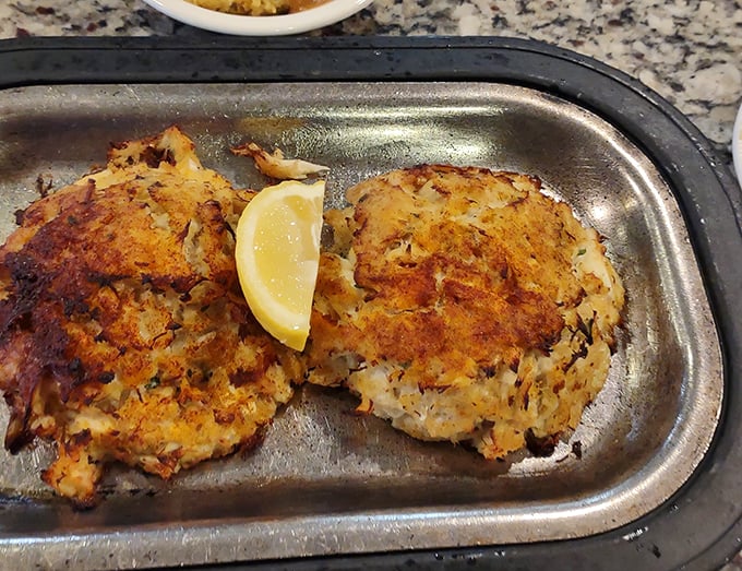 These golden-brown crab cakes aren't just food; they're edible love letters from the Chesapeake, served with a side of Pennsylvania hospitality.