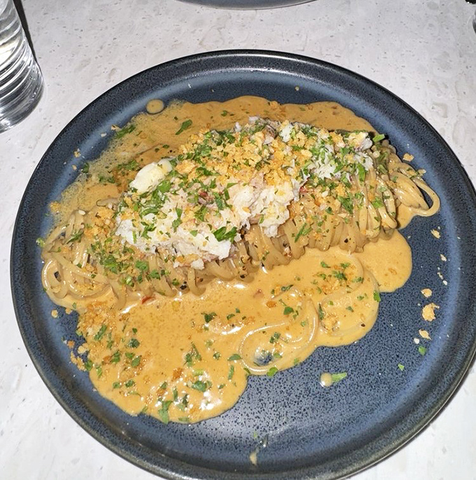 This crab pasta swims in a sauce so luxurious it deserves its own Italian sports car and weekend villa in Tuscany.