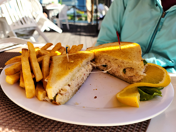 Golden-grilled perfection houses tender crab meat in this sandwich that makes you wonder why you'd ever waste stomach space on ordinary lunch options.