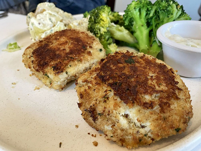 Golden-crusted crab cakes that would make Maryland jealous, paired with perfectly steamed broccoli and creamy potato salad.