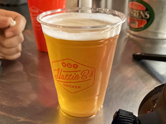 Nothing tames the fire of Nashville hot chicken quite like a cold craft beer, served in a cup that proudly displays its local allegiance.
