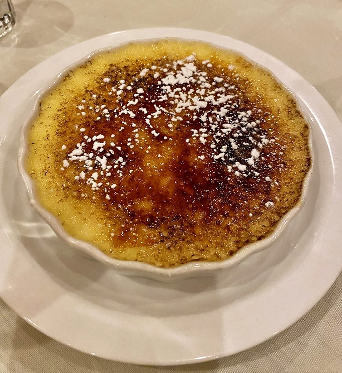 Crème brûlée with that perfect crackling top. Breaking through is like that satisfying moment when you pop bubble wrap—but delicious.