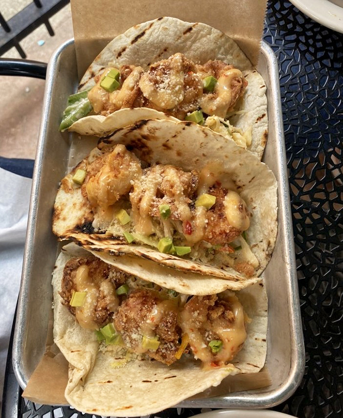 These shrimp tacos aren't just dinner, they're edible architecture&mdash;crispy, saucy towers of seafood that demand to be photographed before they're devoured.