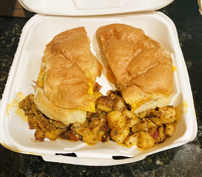 Breakfast sandwich nirvana! Golden-brown croissants cradle eggs and savory fillings, while seasoned potatoes wait patiently for their moment of glory.