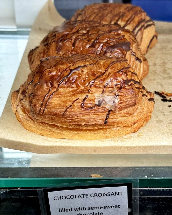 These chocolate croissants aren't just breakfast, they're an architectural marvel of butter and flour that would make French bakers slow-clap in approval.