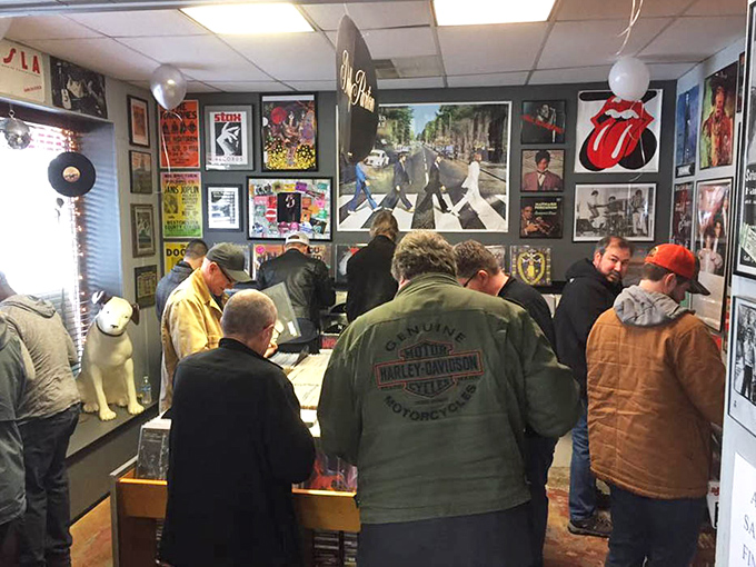 The music memorabilia section draws enthusiasts like moths to vintage neon. Beatles fans and vinyl collectors find their happy place here.
