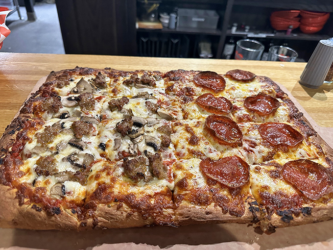 The Sicilian square pizza &ndash; architectural marvel of dough engineering with a foundation sturdy enough to support those magnificent toppings.