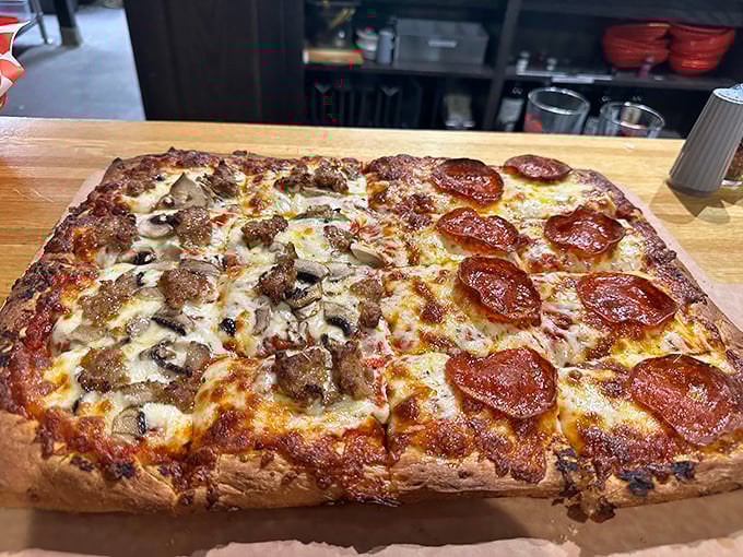 The Sicilian square pizza &ndash; architectural marvel of dough engineering with a foundation sturdy enough to support those magnificent toppings.