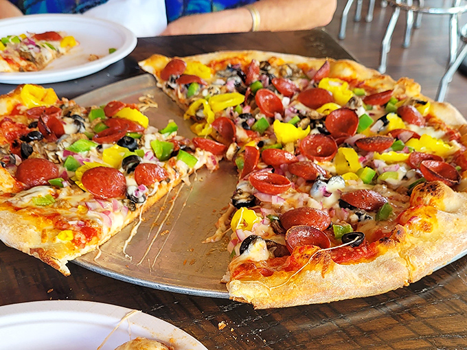 Fresh dough pizza loaded with toppings that actually reach the edge. No sad, barren crust borders in this Pennsylvania paradise.