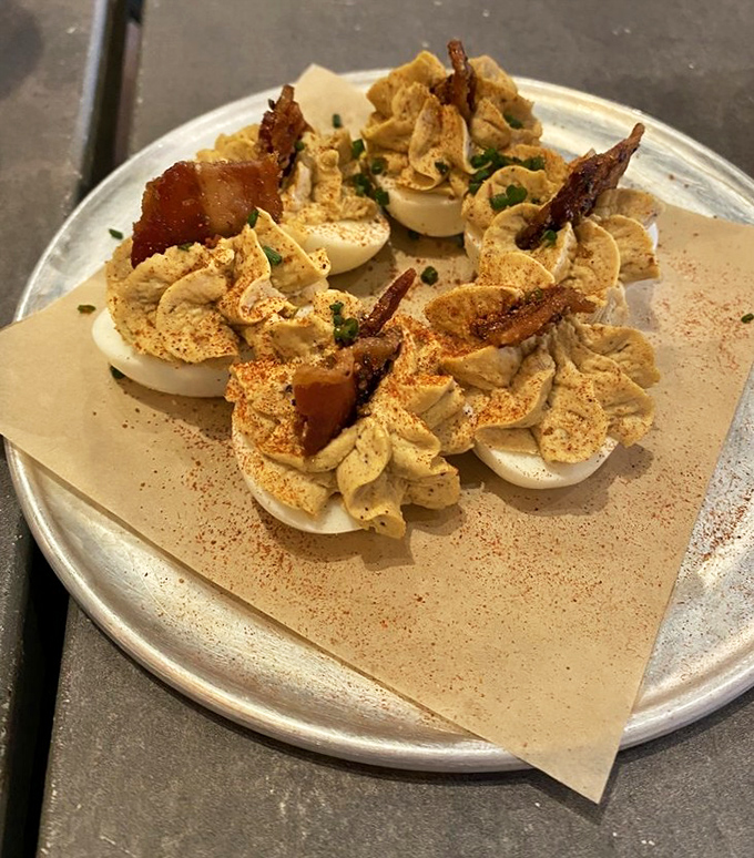 These aren't your grandmother's deviled eggs, unless she happened to moonlight as a barbecue genius with candied bacon flair.