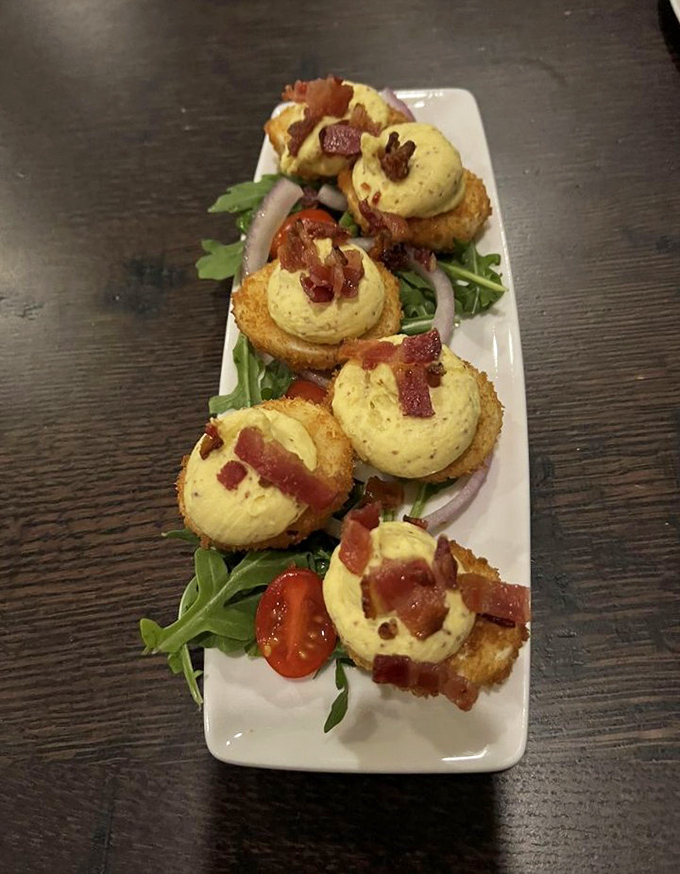 These aren't your grandmother's deviled eggs (unless your grandmother was a culinary genius). Topped with candied bacon, they're small bites of heaven.