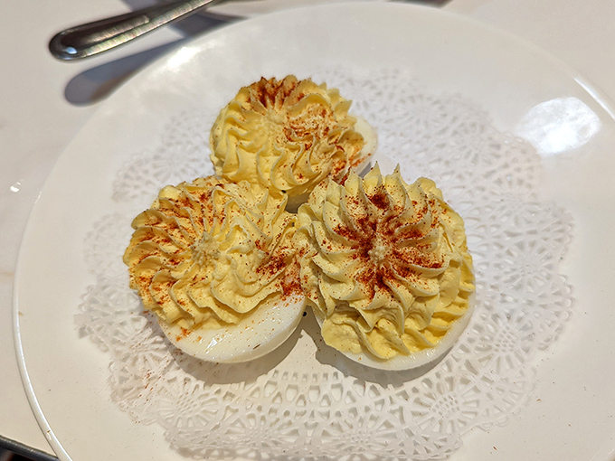 Deviled eggs dressed for success with paprika stars. These aren't your standard potluck appetizers&mdash;they're little works of edible art.