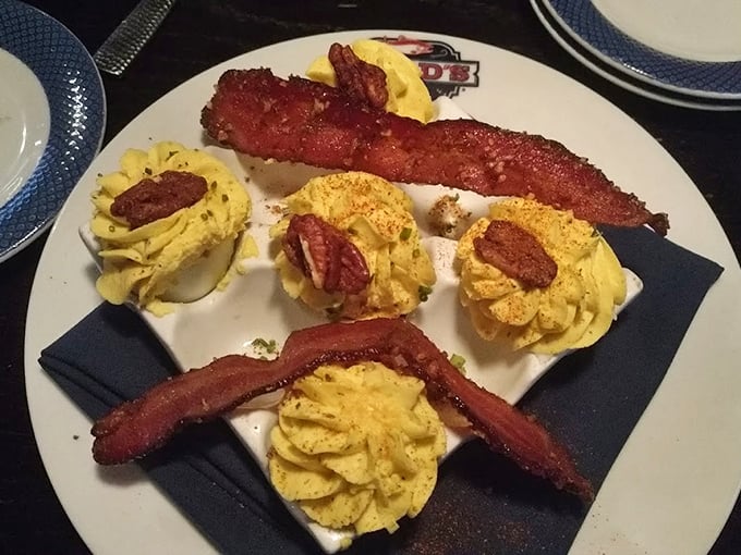 Deviled eggs get the royal treatment with bacon crowns. These yellow thrones of deliciousness make ordinary eggs feel hopelessly underdressed.