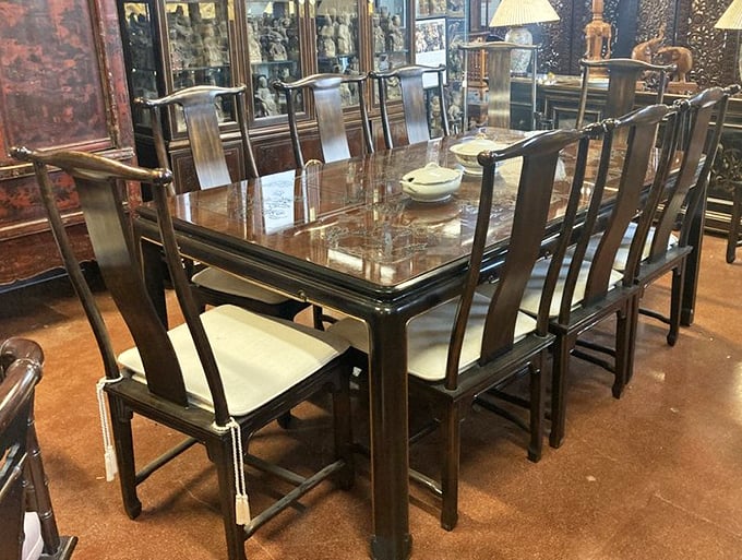 This elegant Asian-inspired dining set isn't just furniture—it's a time machine to more formal dinners where nobody stared at their phones.