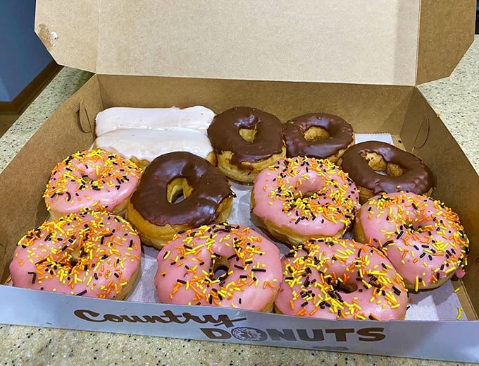 A dozen reasons to share, or twelve arguments for keeping them all to yourself. The Halloween sprinkles say "festive," but the chocolate says "serious business."