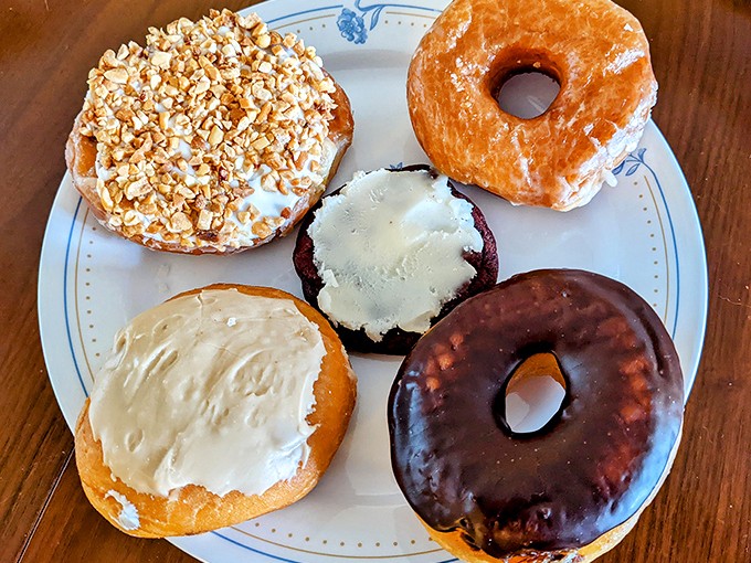 A plate of possibilities. Each donut represents a different path your morning could take, and there's not a wrong choice in sight.