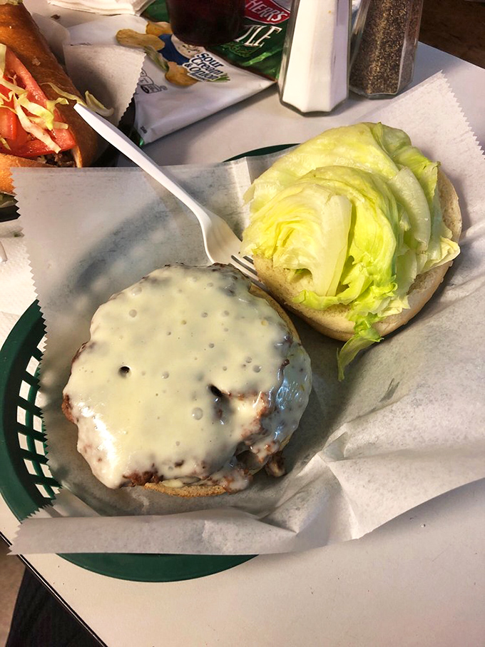 A proper cheesesteak with American cheese and lettuce on the side. In Philly, this is what they call "balanced nutrition."