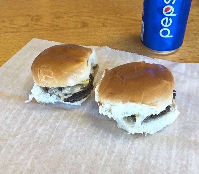 Two humble sliders on wax paper&mdash;proof that greatness doesn't need to be supersized to satisfy the soul.