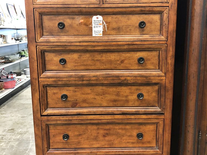 This isn't just a dresser; it's a time capsule of craftsmanship with drawers deep enough to hold both your clothes and your grandmother's approval.