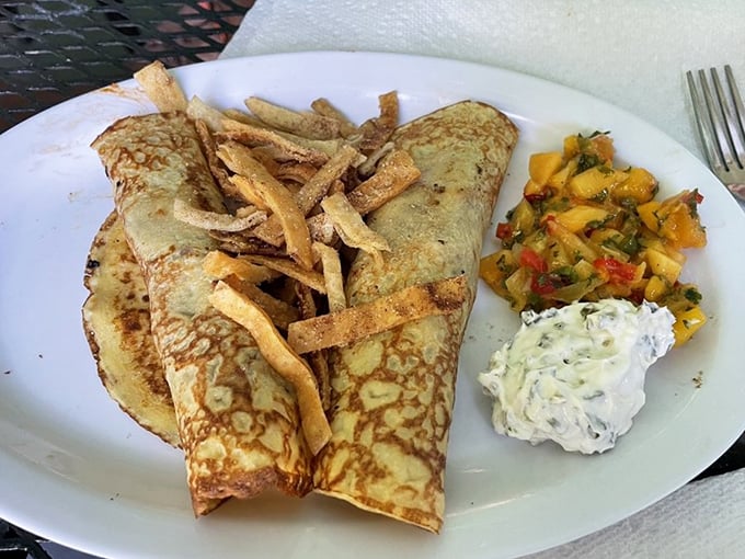 These aren't your grandmother's crepes (unless she was a culinary genius). Golden pancakes wrapped around savory duck with crispy wonton strips &ndash; pure magic.