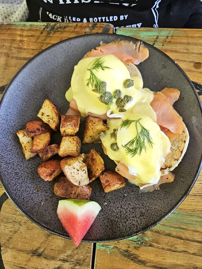 Salmon Benedict that would make Hemingway put down his pen and pick up a fork. That watermelon heart is pure Key West charm.