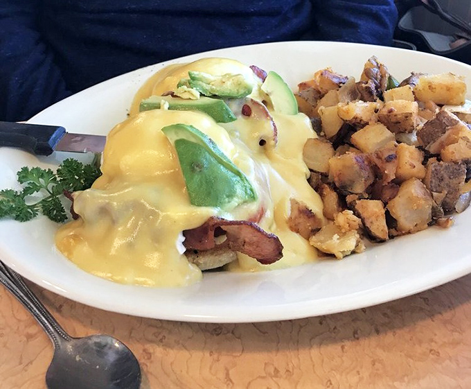 Eggs Benedict with avocado and home fries &ndash; proof that California knows how to elevate a classic without losing its soul.