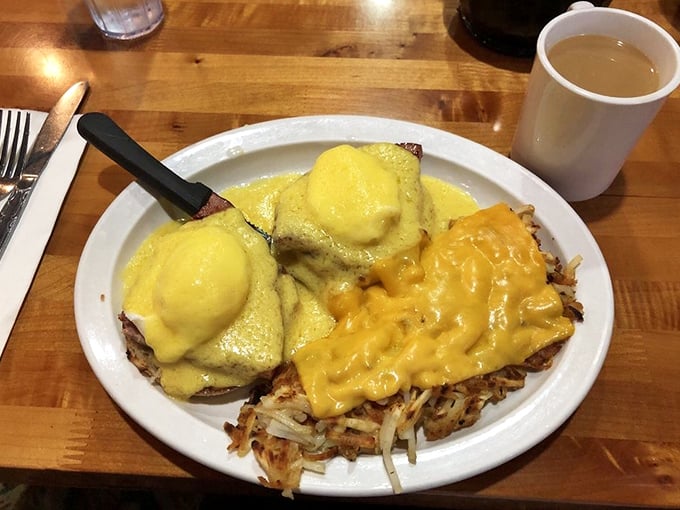 Breakfast of champions! Golden hash browns support eggs Benedict that's dressed for success with hollandaise that would make Julia Child swoon.