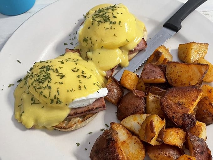 Eggs Benedict done right&mdash;perfectly poached eggs, Canadian bacon, and hollandaise that would make Julia Child nod in approval. Those home fries aren't just a sidekick, they're a co-star.