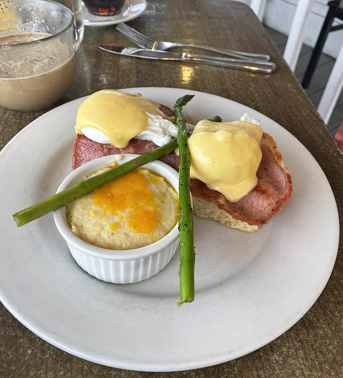 Eggs Benedict reimagined with thick-cut ham and asparagus &ndash; proof that classics can be improved upon, like when they added color to The Wizard of Oz.