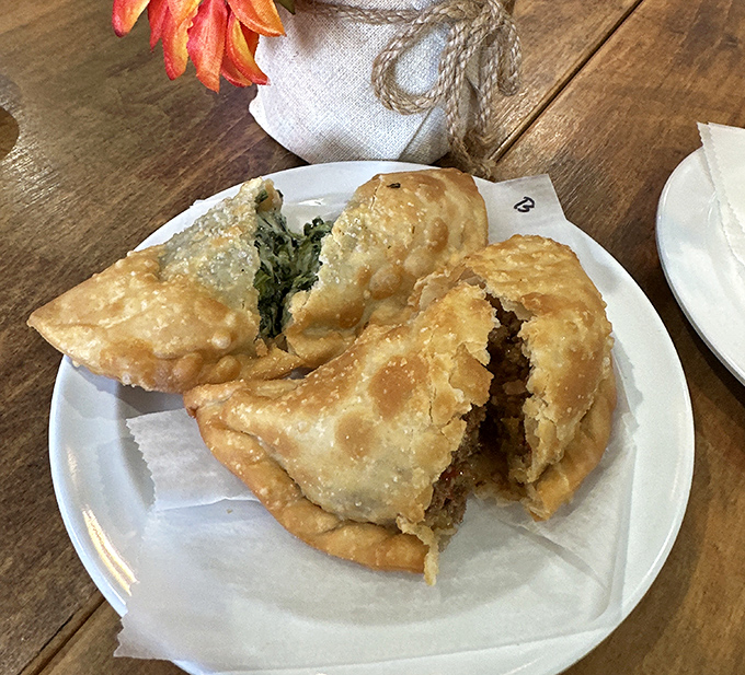 These empanadas aren't just golden-brown &ndash; they're treasure chests of flavor waiting to be cracked open by hungry explorers.