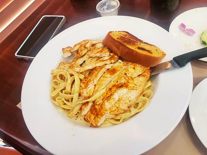 Fettuccine Alfredo with grilled chicken that would make an Italian grandmother nod in approval&mdash;simple perfection on a plate.