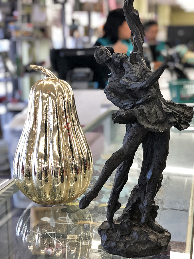 One person's decluttered mantel becomes another's conversation piece. That golden pear wouldn't look out of place in a designer showroom.