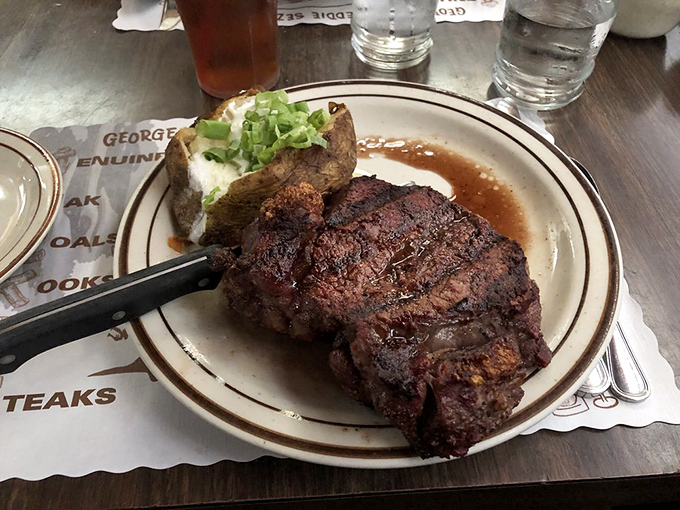 This isn't just any steak&mdash;it's the reason people drive for hours and dream about Jocko's for weeks. That char speaks volumes about oak-pit mastery.