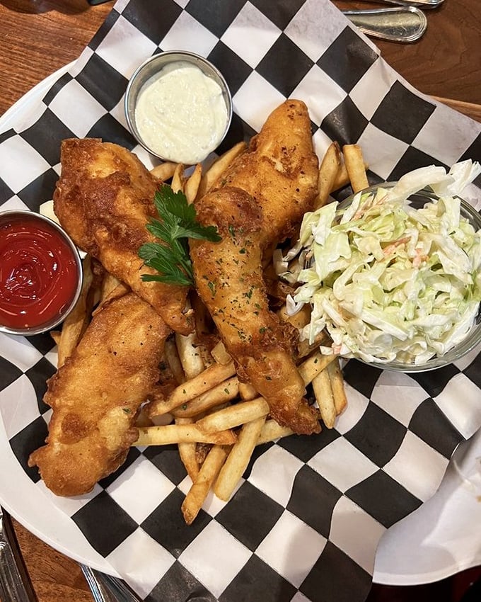 Golden-battered fish that shatters at first bite, fries worth fighting over, and slaw that isn't an afterthought&mdash;this is how fish and chips should always be.