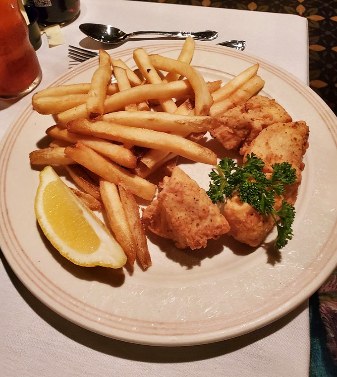 Golden fries standing at attention beside crispy fish&mdash;a plate that would make Captain Birds Eye salute with respect.