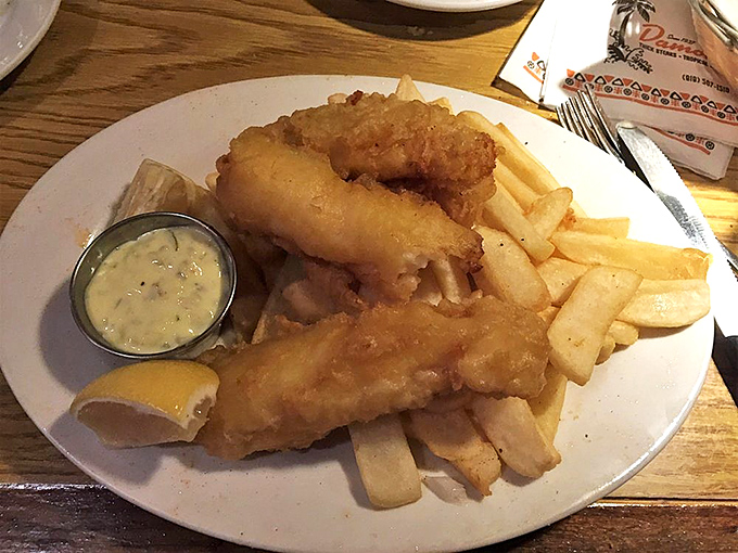 Golden-battered fish and crispy fries—the kind that make you wonder if mermaids get jealous watching humans enjoy seafood this delicious.