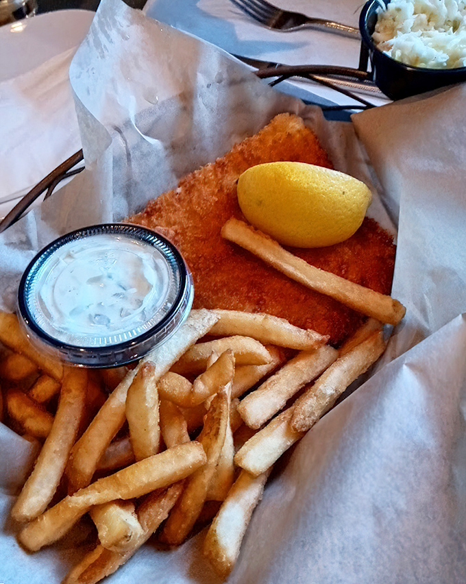 Fish and chips that would make the British weep with joy. That golden panko crust shatters with each bite, revealing flaky perfection within.