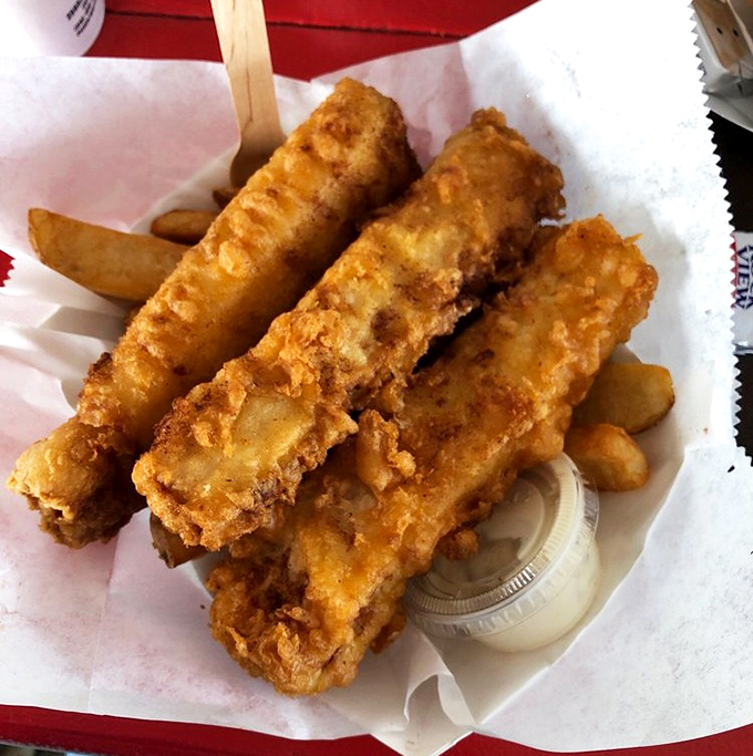 Golden-battered fish and chips that make you question your loyalty to every other version you've ever sworn by.