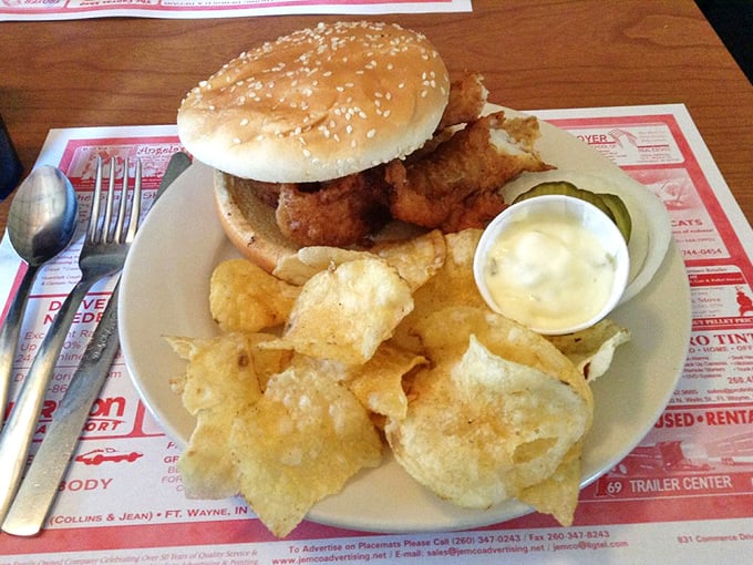 The fish sandwich that proves sometimes the most beautiful relationships come wrapped in a sesame seed bun with crispy chips.