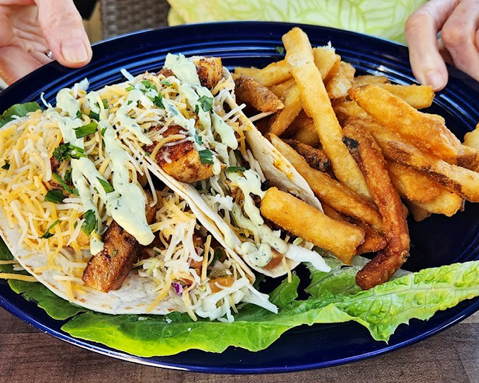 Taco Tuesday just found its forever home. Fresh fish nestled in soft tortillas with crisp slaw and melty cheese—proof that the best things in life come wrapped in carbs.